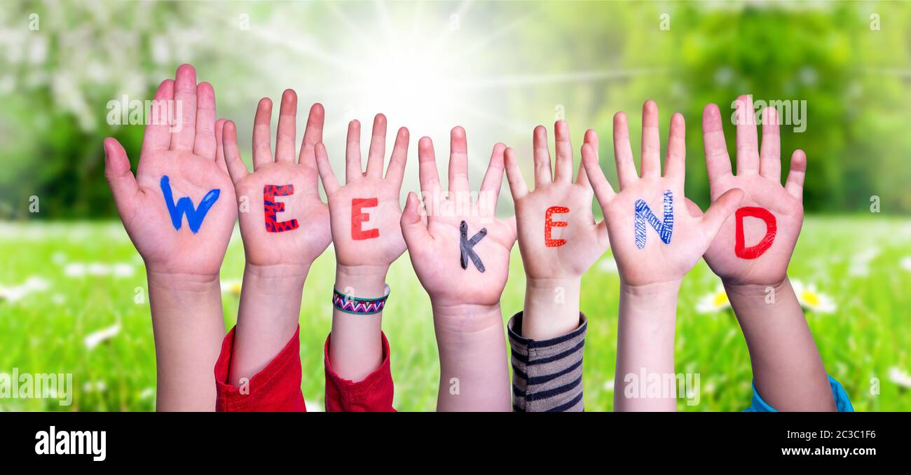 Children Hands Building Colorful Word Weekend. Green Grass Meadow As ...