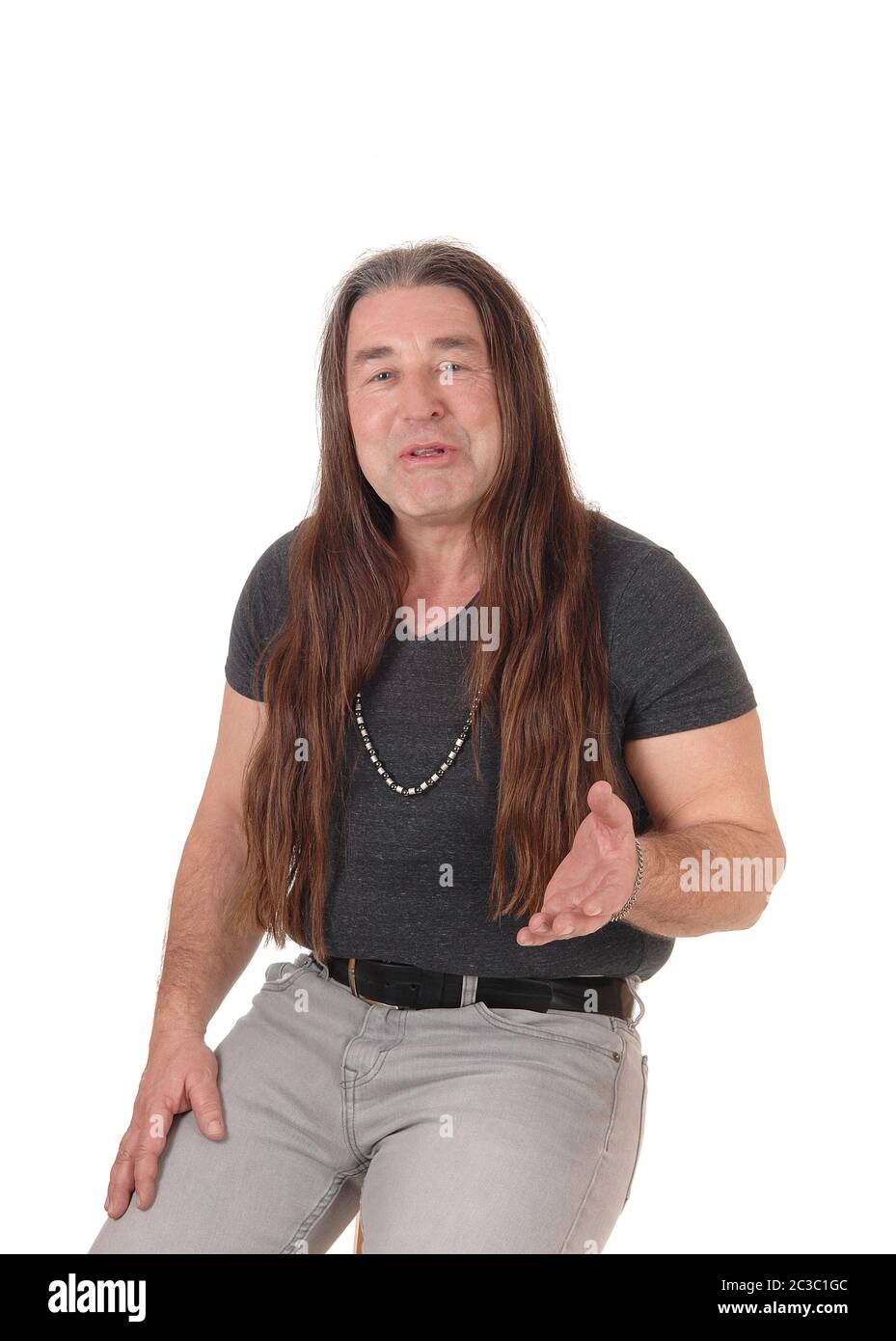 A middle age indigenous man in a portrait picture wearing a black shirt ...