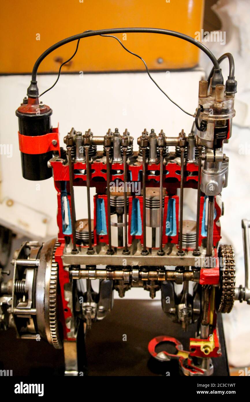 Detail view of a cut open engine of a car, 4 stroke engine, with ...