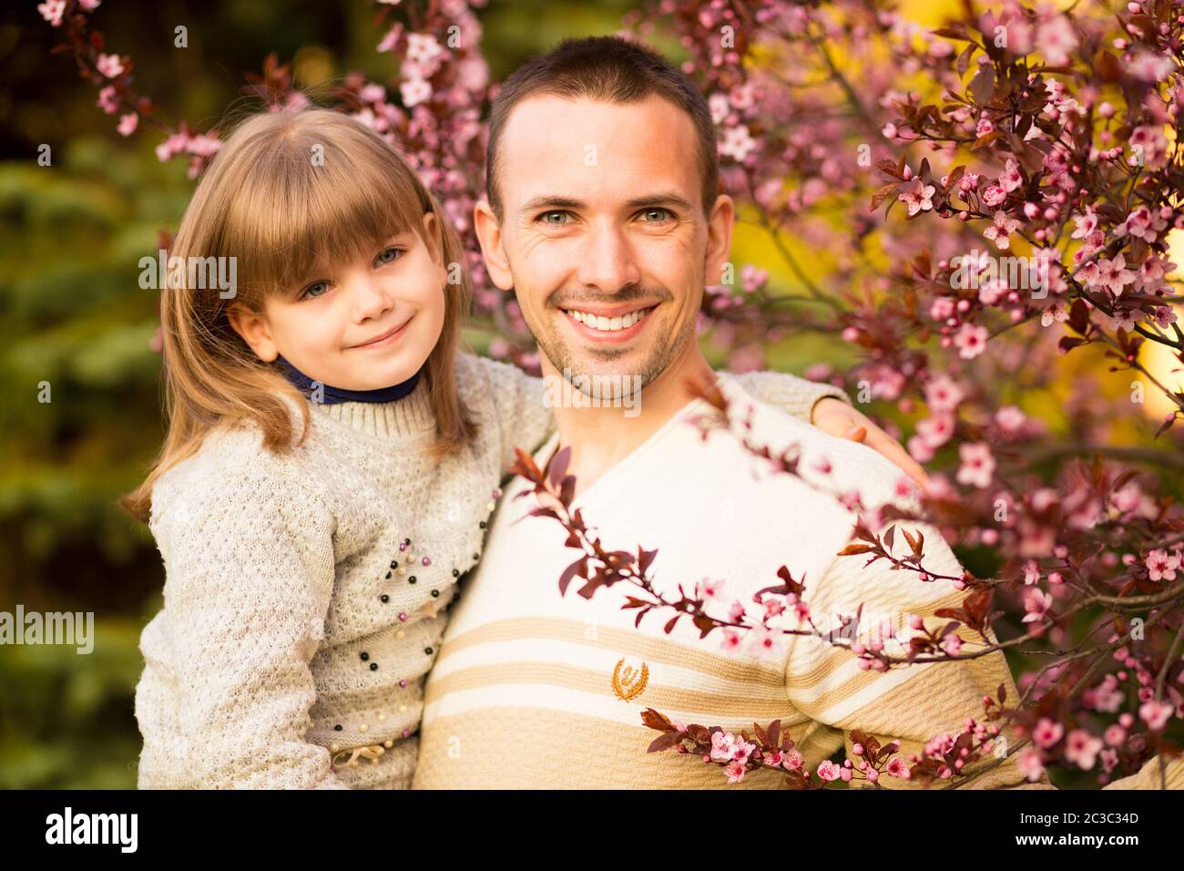 Close up portrait pretty daughter embracing Caucasian father. Family ...
