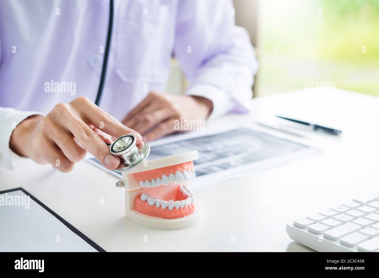 dentist doctor hands using Stethoscope to checkup tooth health, dental ...