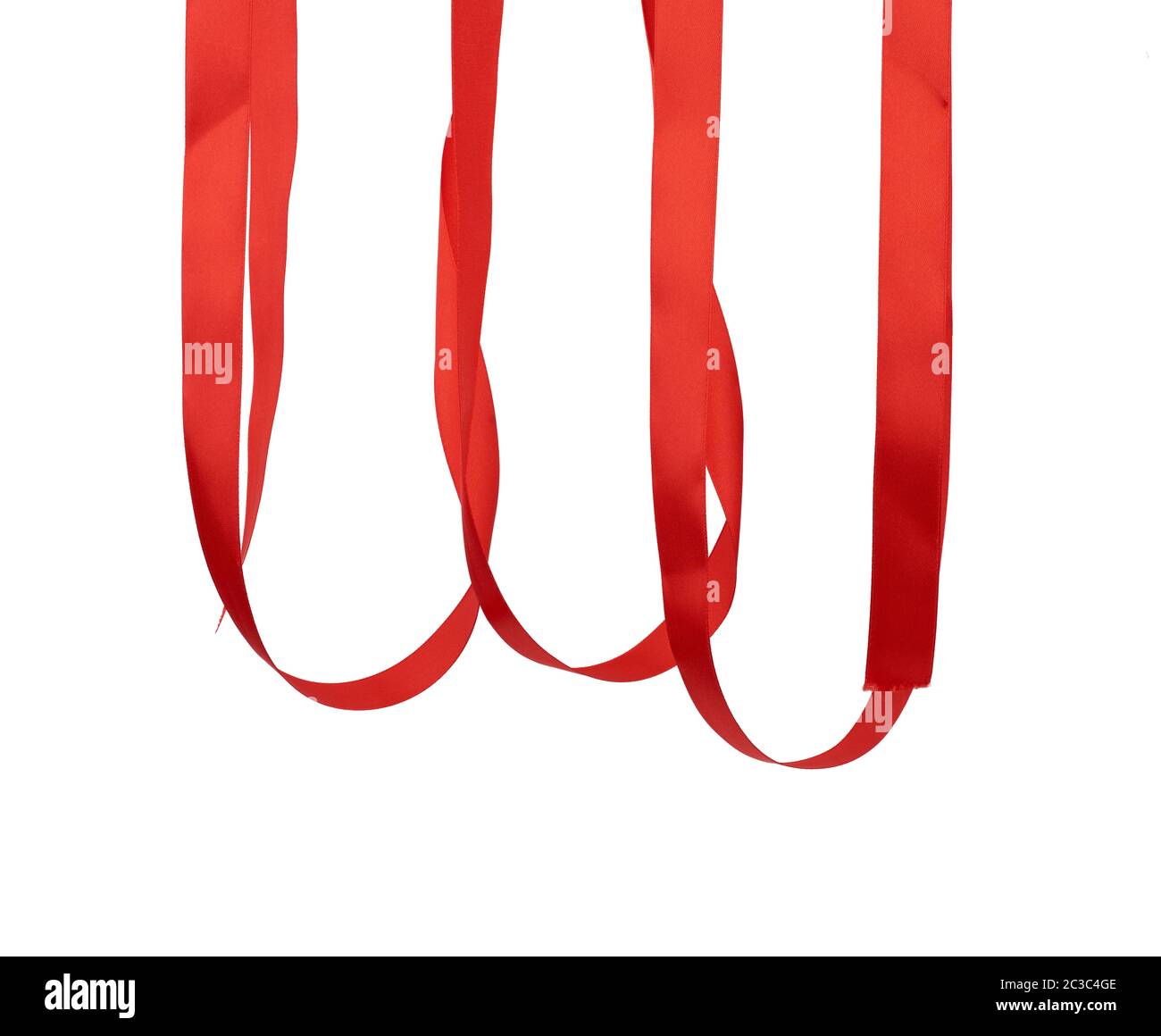 hanging red silk ribbon for packing gifts isolated on a white ...