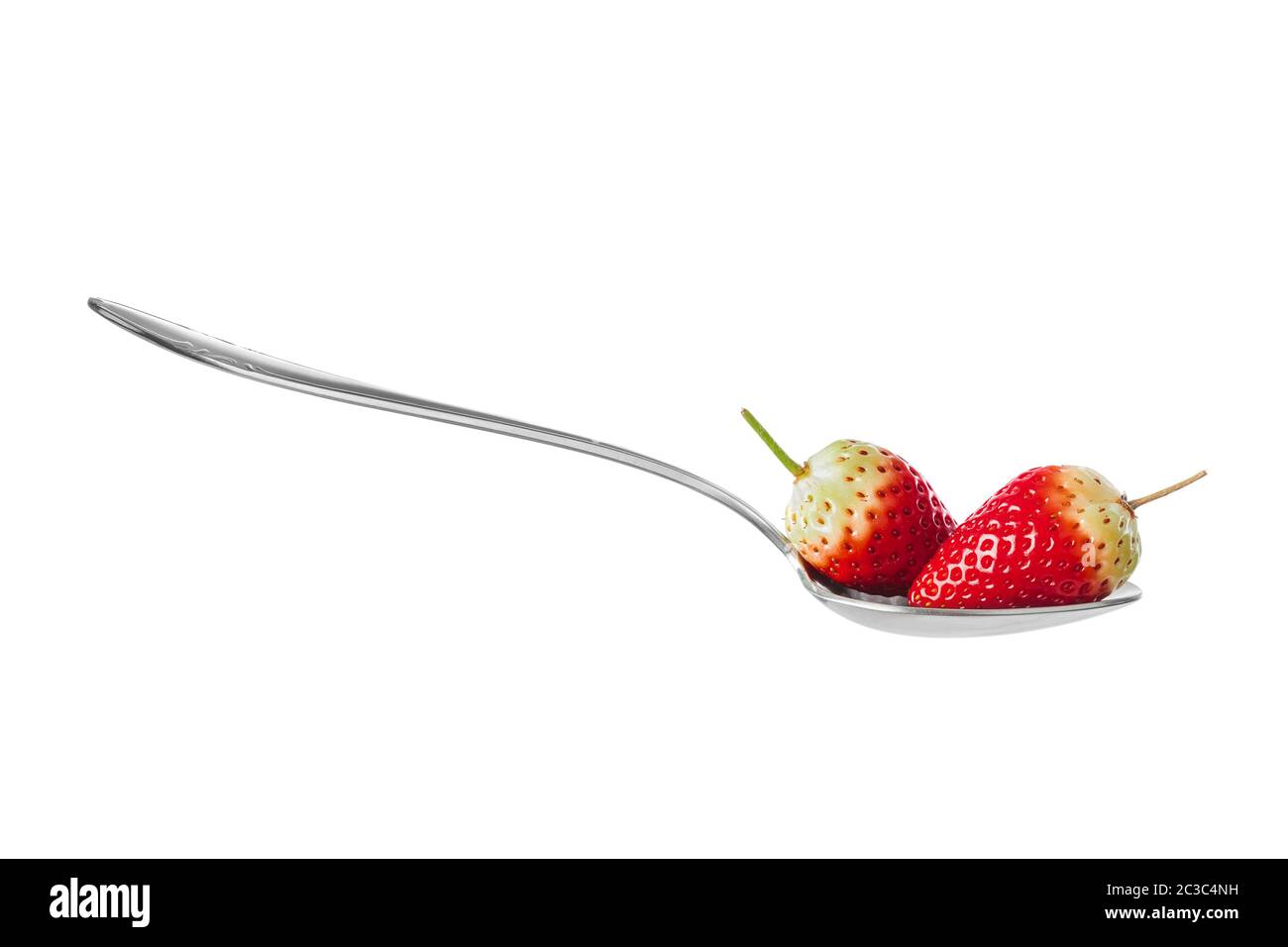Spoon with strawberry Stock Photo - Alamy