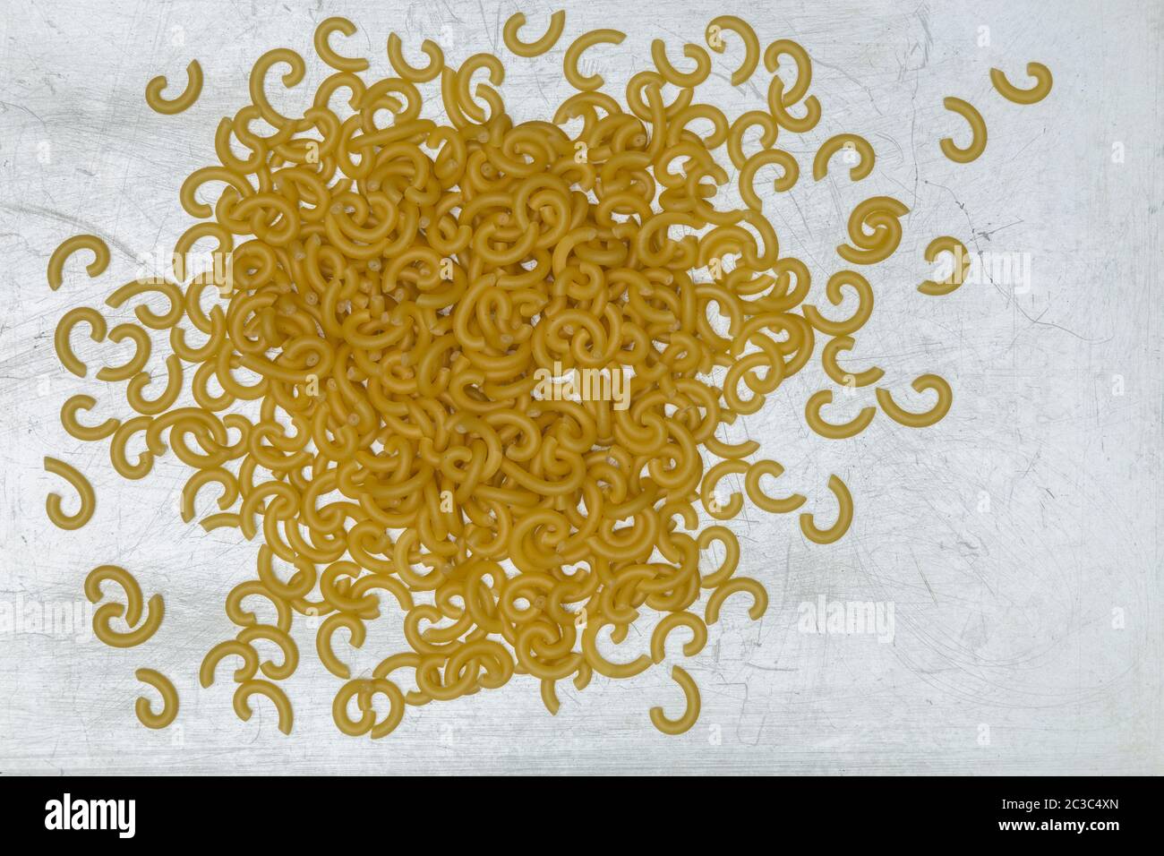 Gobbetti pasta on baking tray Stock Photo - Alamy