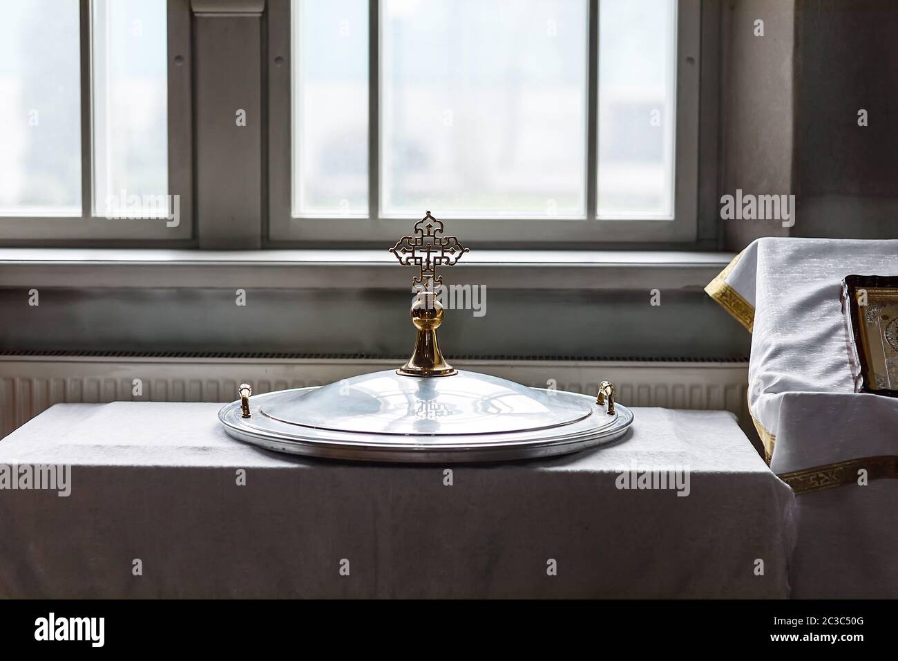 Candle baptismal font hi-res stock photography and images - Alamy