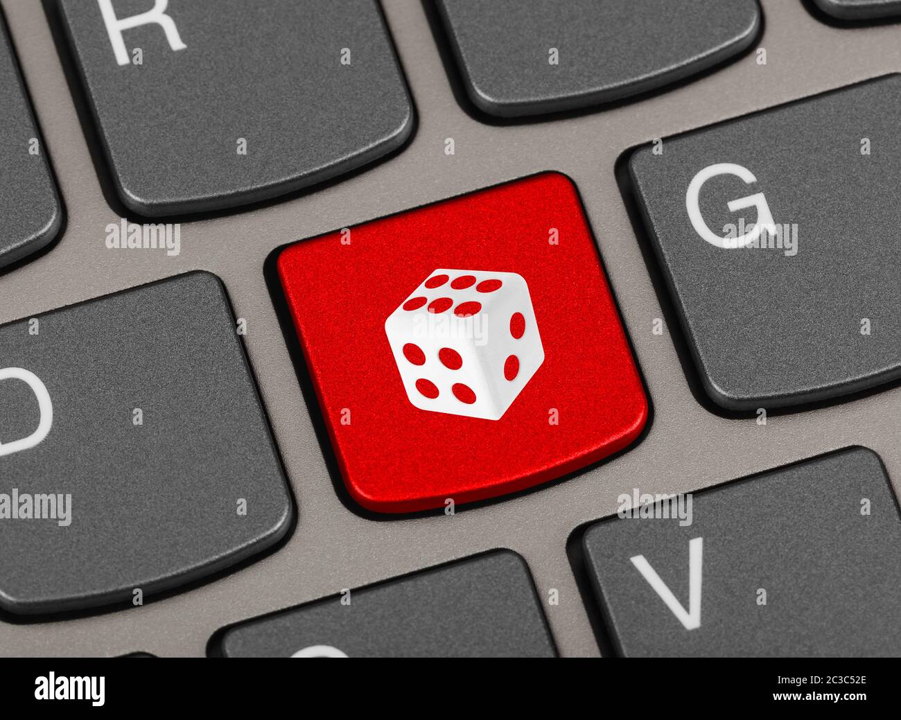 Computer keyboard with dice key Stock Photo - Alamy