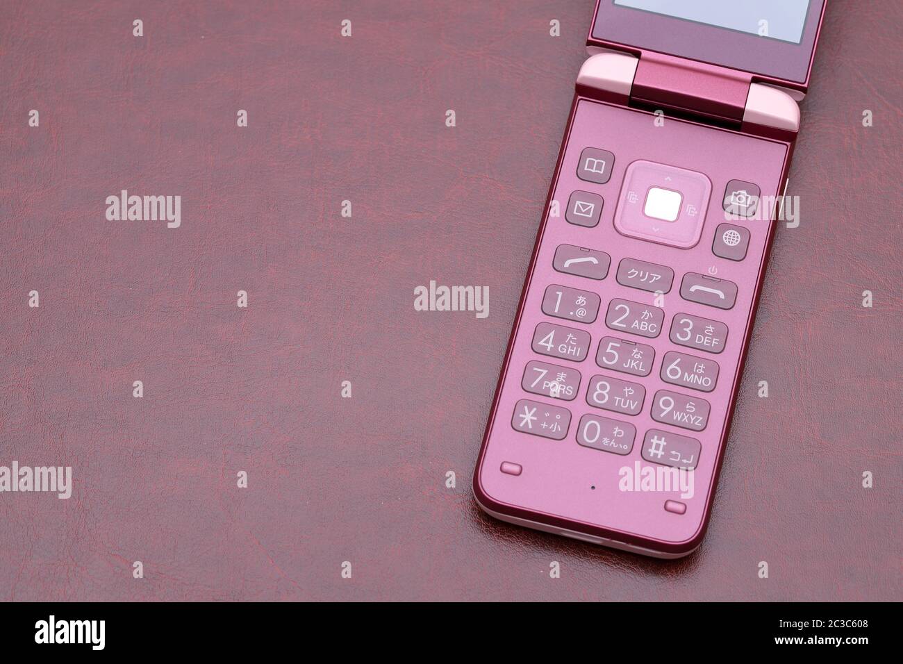 Japanese Mobile phone on table, Garake. Japanese word of this ...