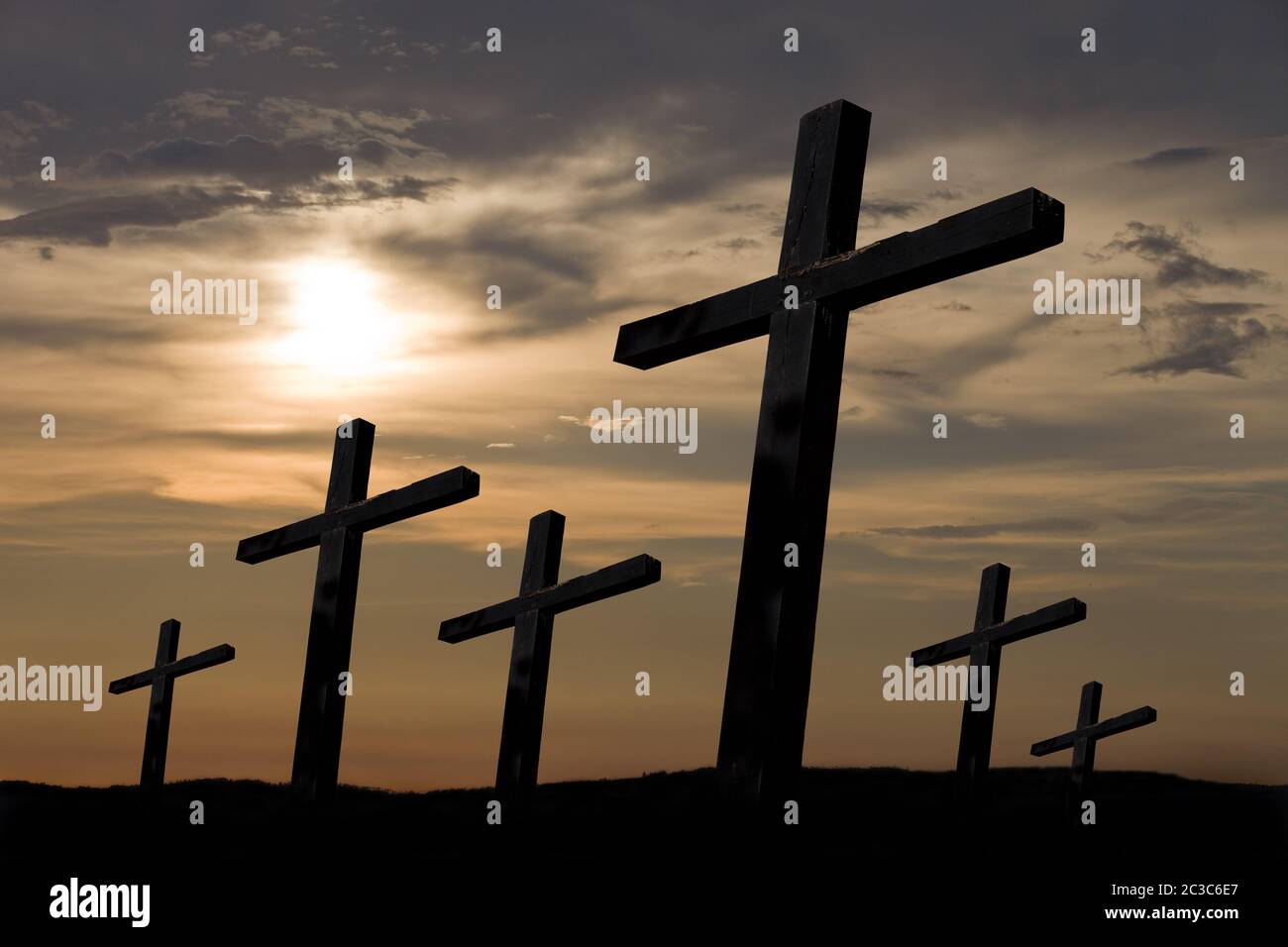 cross silhouette and the clouds at sunset Stock Photo - Alamy
