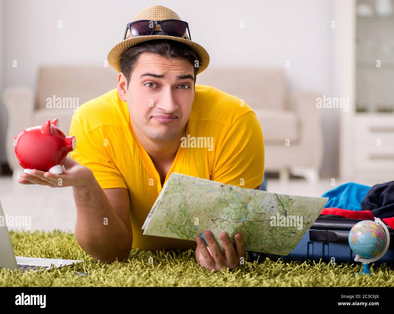 Man planning his vacation trip with map Stock Photo - Alamy