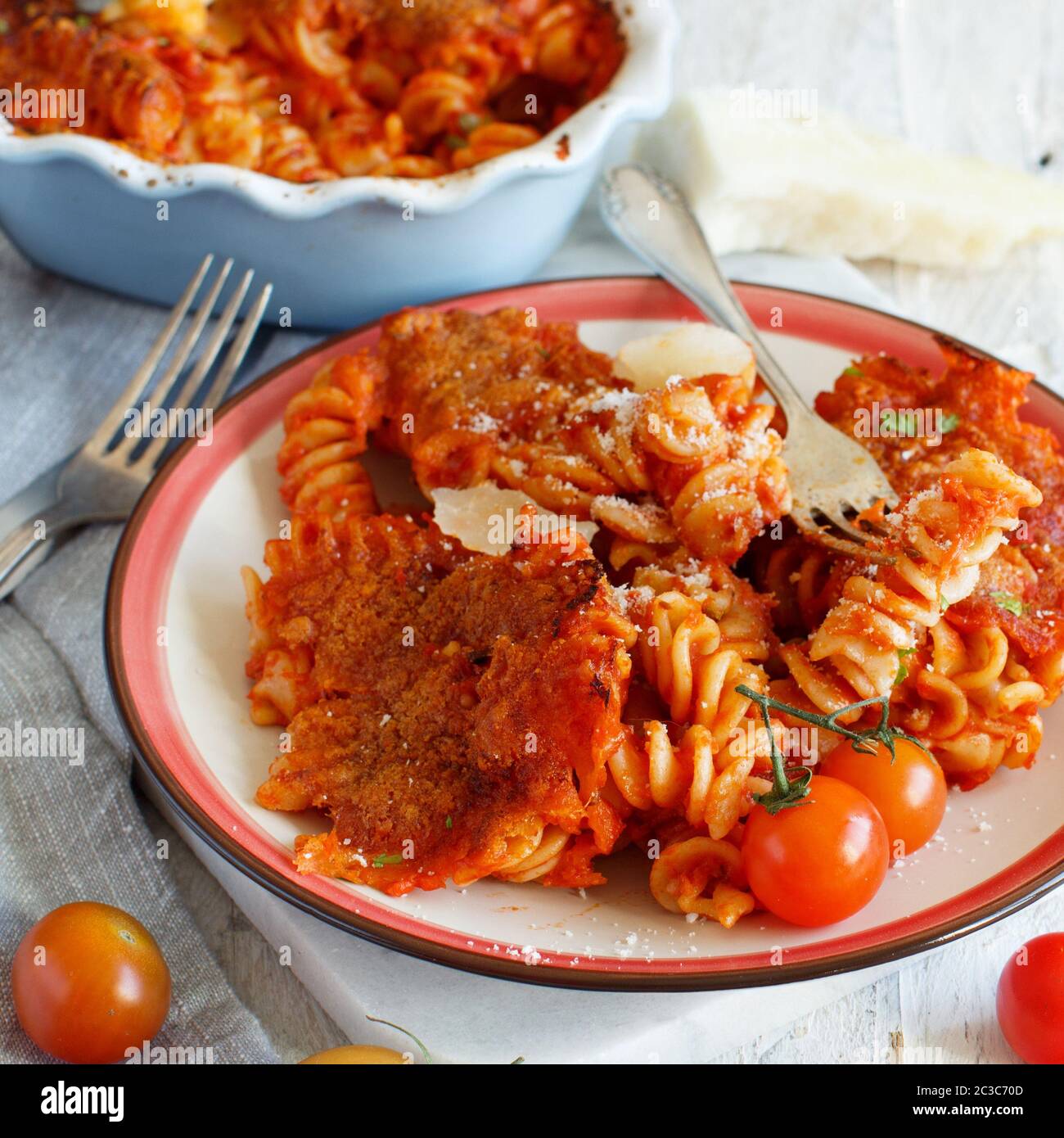 Baked fusilli pasta with tomato sauce and mozzarella cheese Stock Photo ...