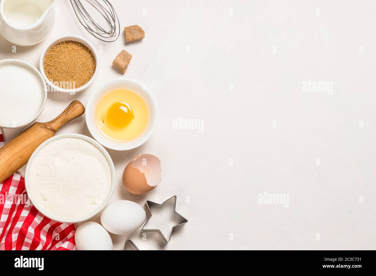 Baking ingredients at blue table top view Stock Photo - Alamy