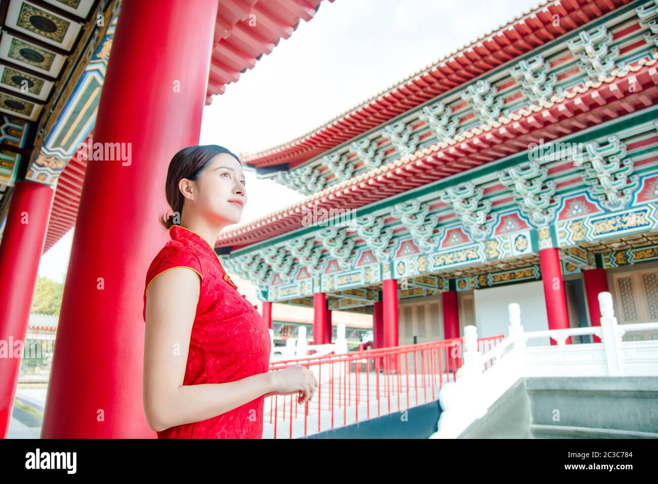 Asian young woman in old traditional Chinese dresses in the Temple ...