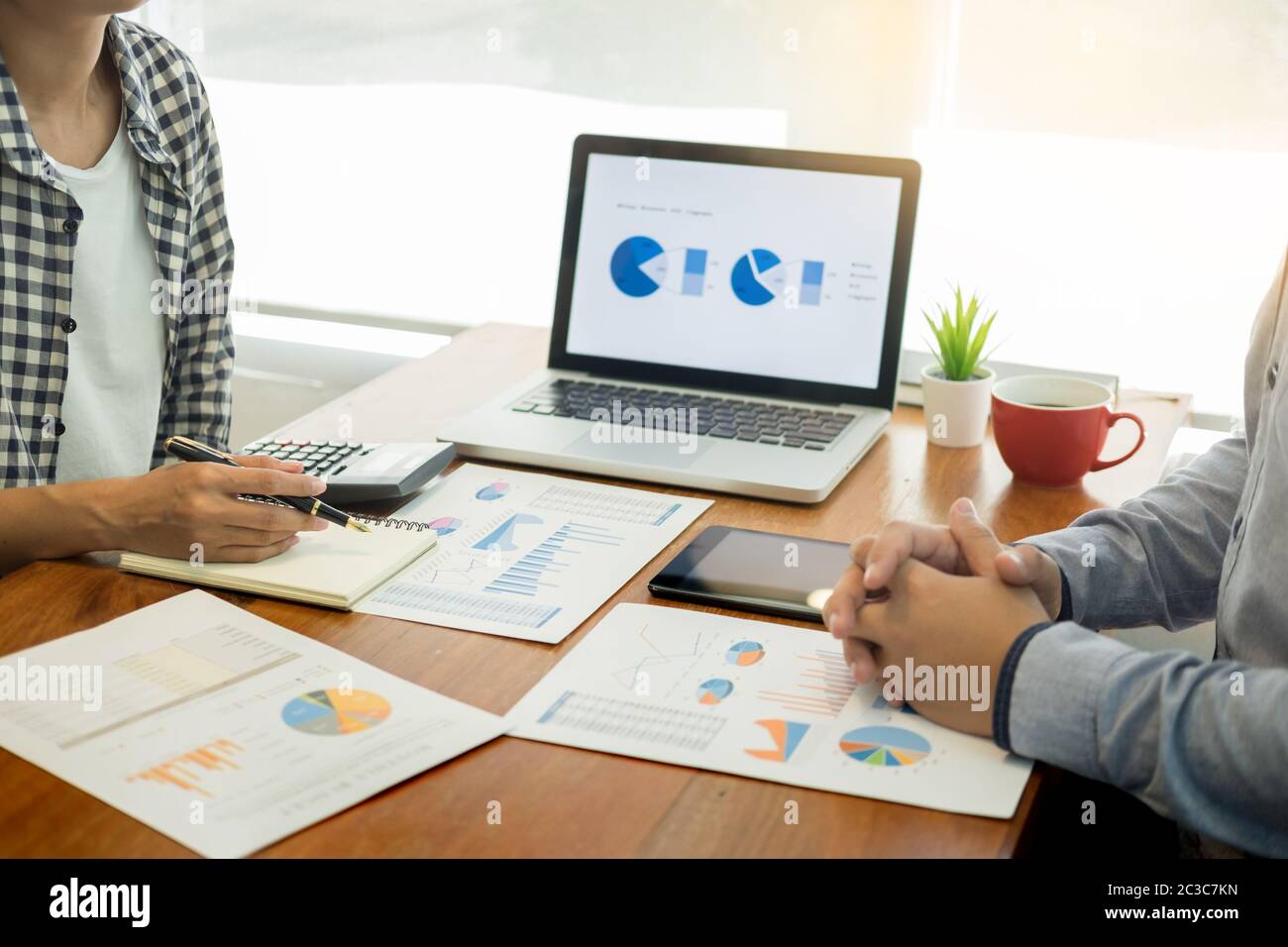 Business creative coworkers team Meeting Discussing showing the results ...