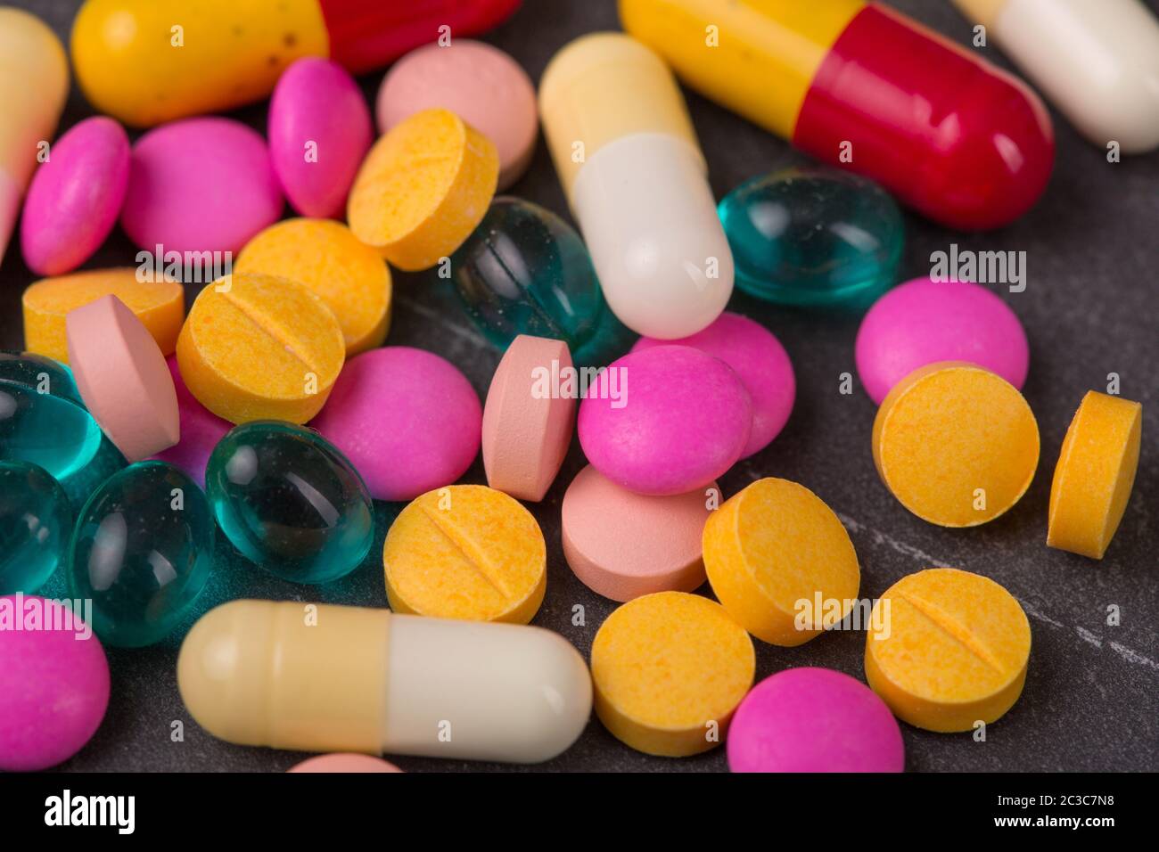 different tablets pills capsule heap mix therapy drugs Stock Photo - Alamy