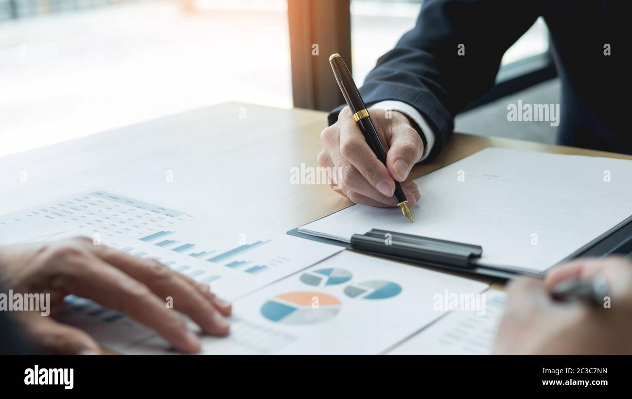 Business creative coworkers team Meeting Discussing showing the results ...