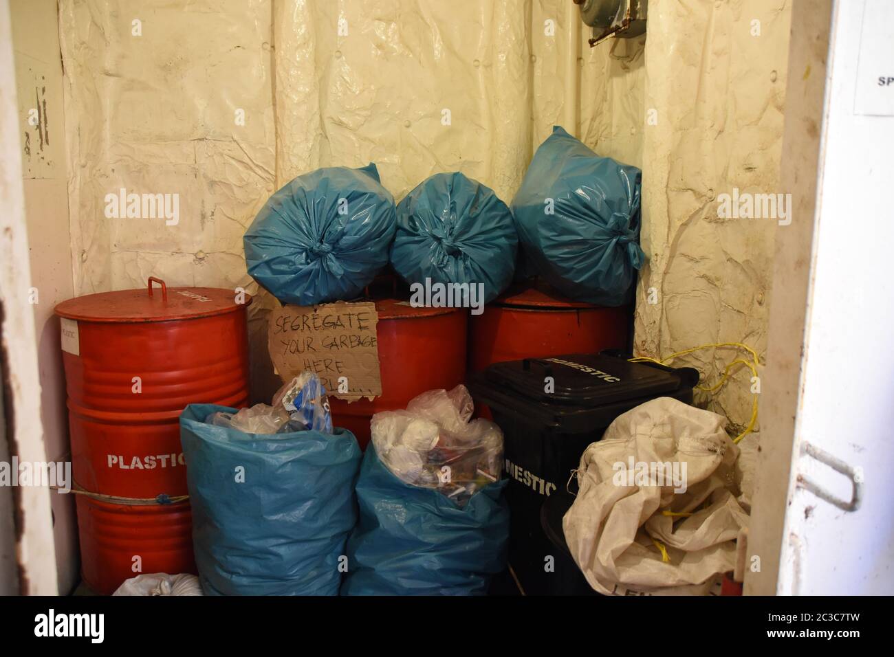 Garbage in fireproof garbage room painted white protected by water ...