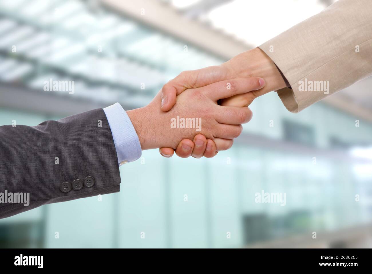 Business men hand shake at the office Stock Photo - Alamy