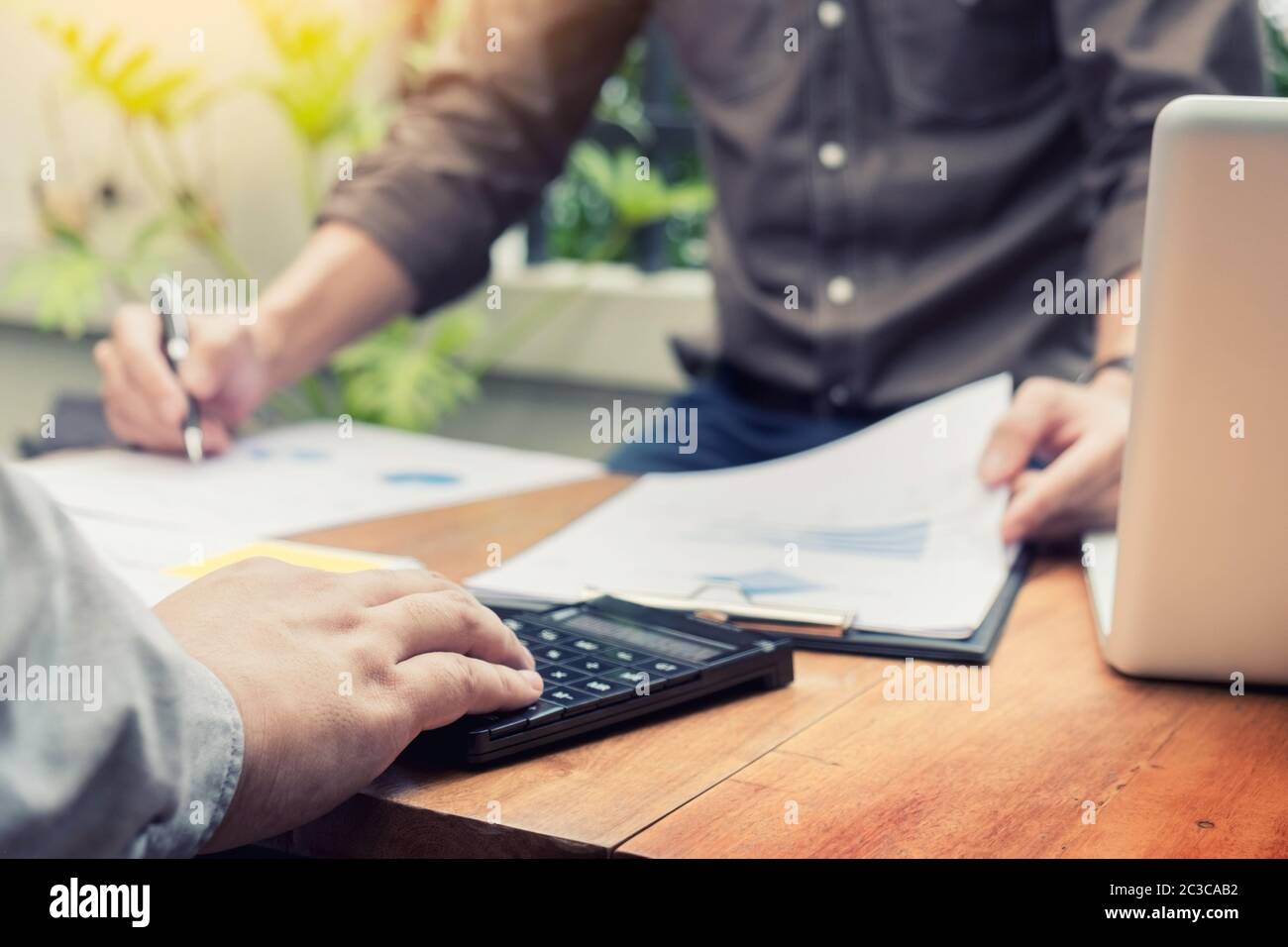 Administrator business man financial inspector and secretary making report, calculating or ...