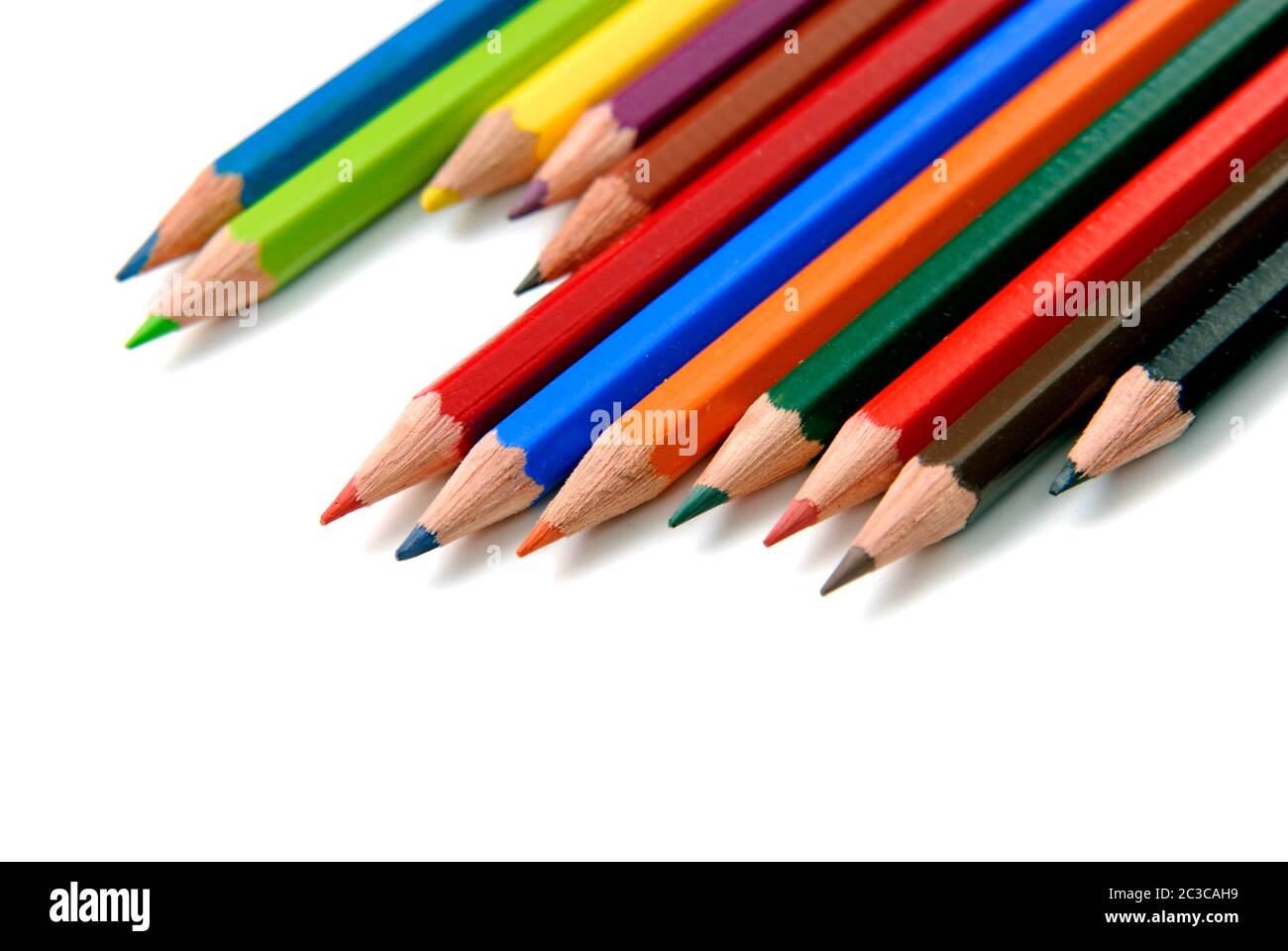 color pencils aligned and isolated on white Stock Photo - Alamy