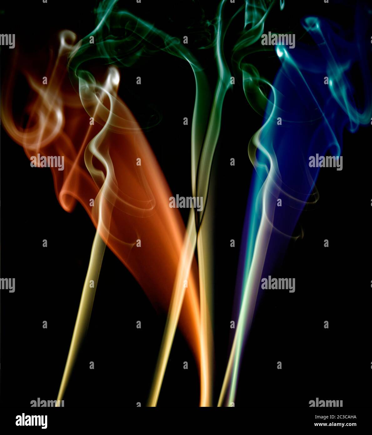abstract colored smoke in a black background Stock Photo - Alamy