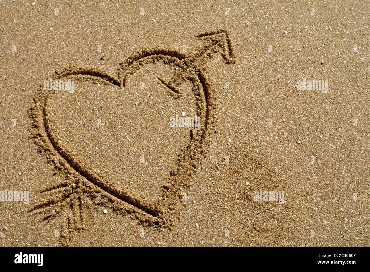 Hand drawn heart on the sand detail Stock Photo - Alamy