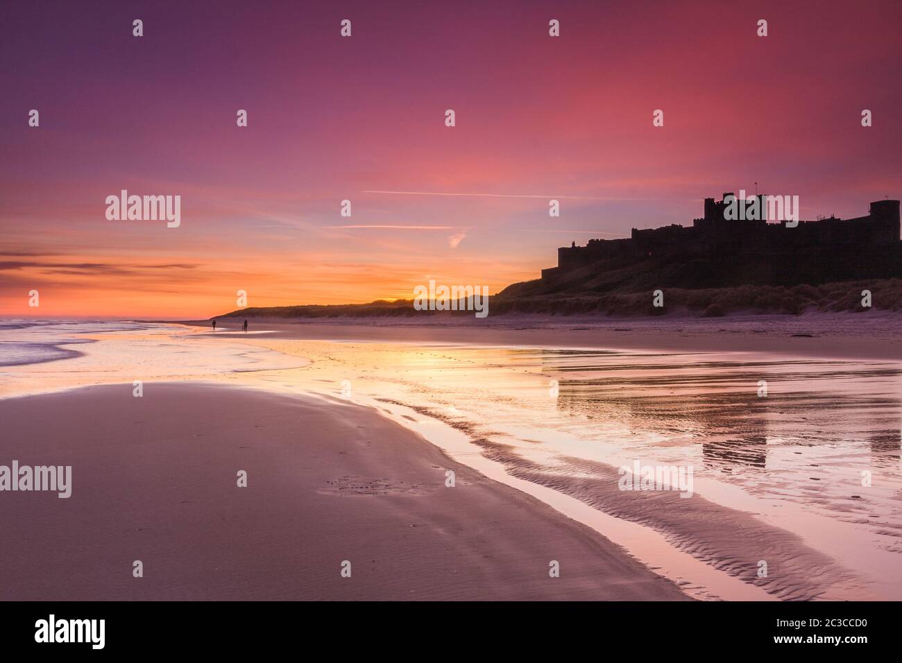 A Sunrise Reflection of Bamburgh Castle on the Northumberland Coast ...