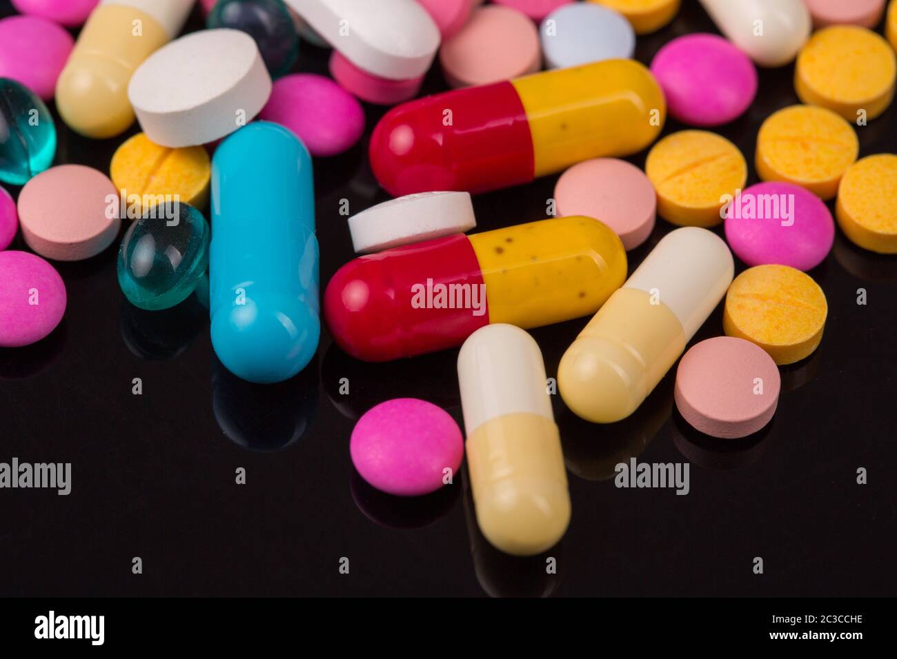different tablets pills capsule heap mix therapy drugs Stock Photo - Alamy