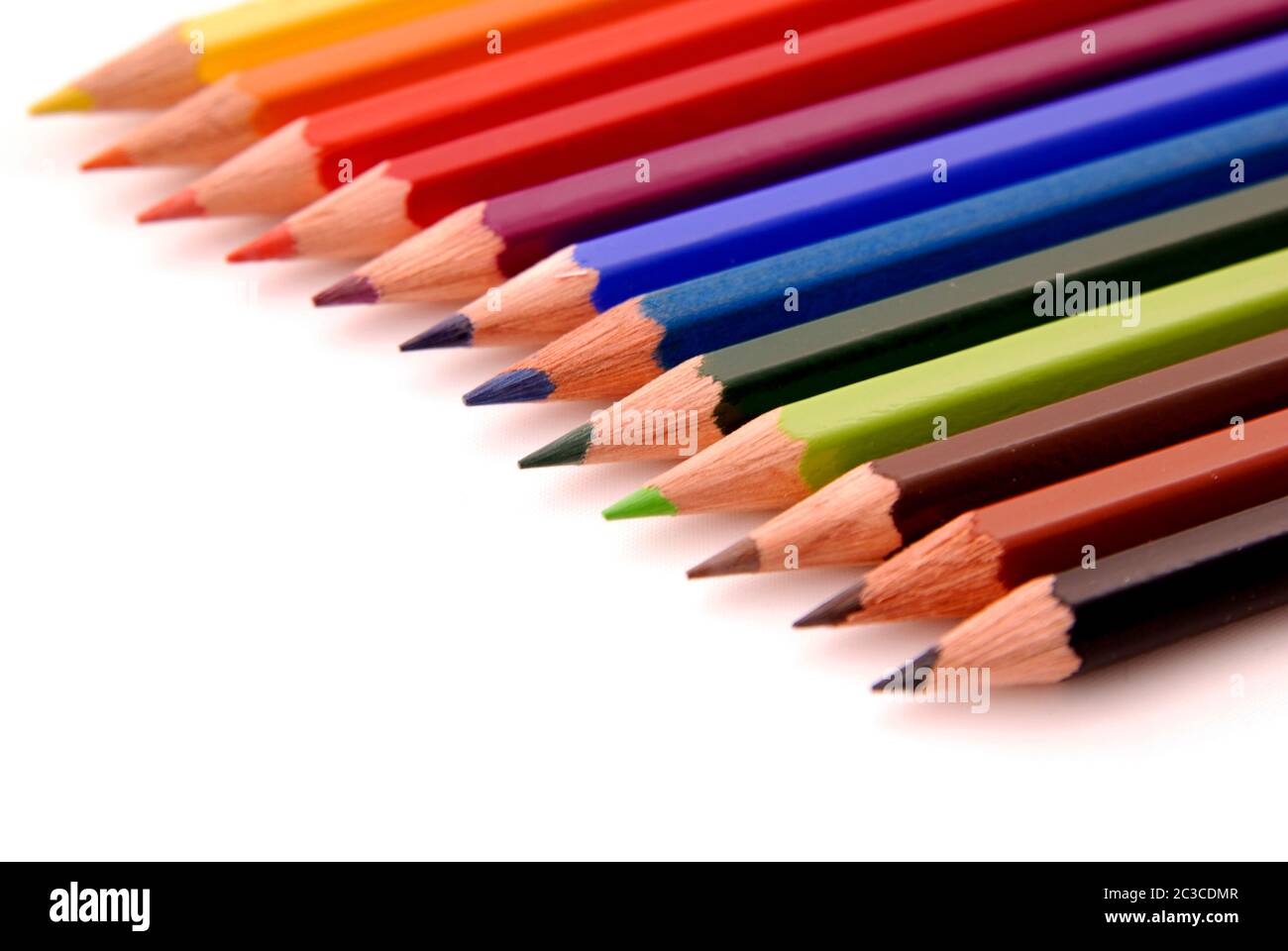 color pencils aligned and isolated on white Stock Photo - Alamy