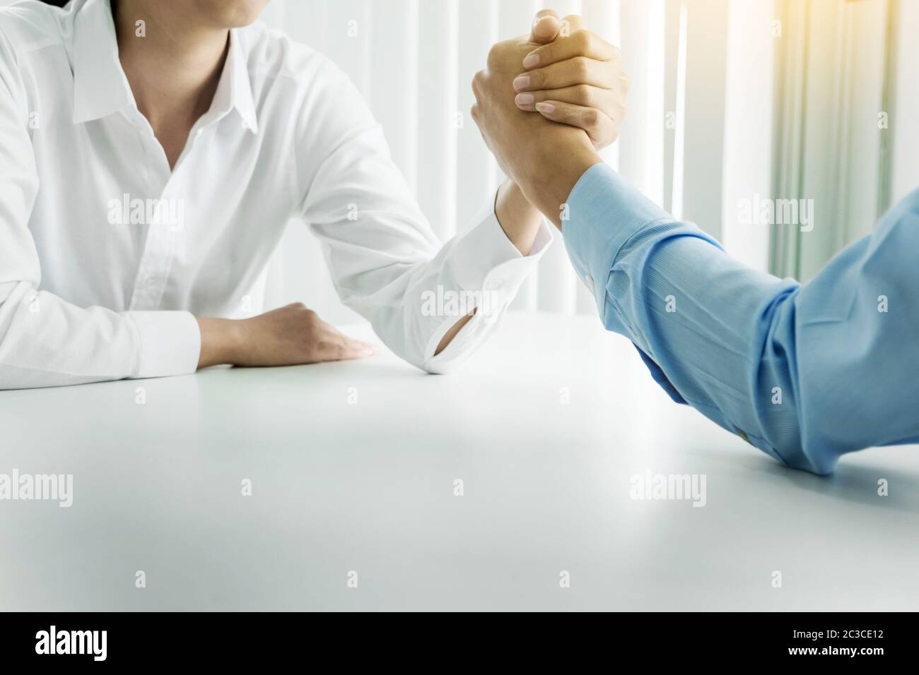 Colleagues hands clasped together hi-res stock photography and images ...