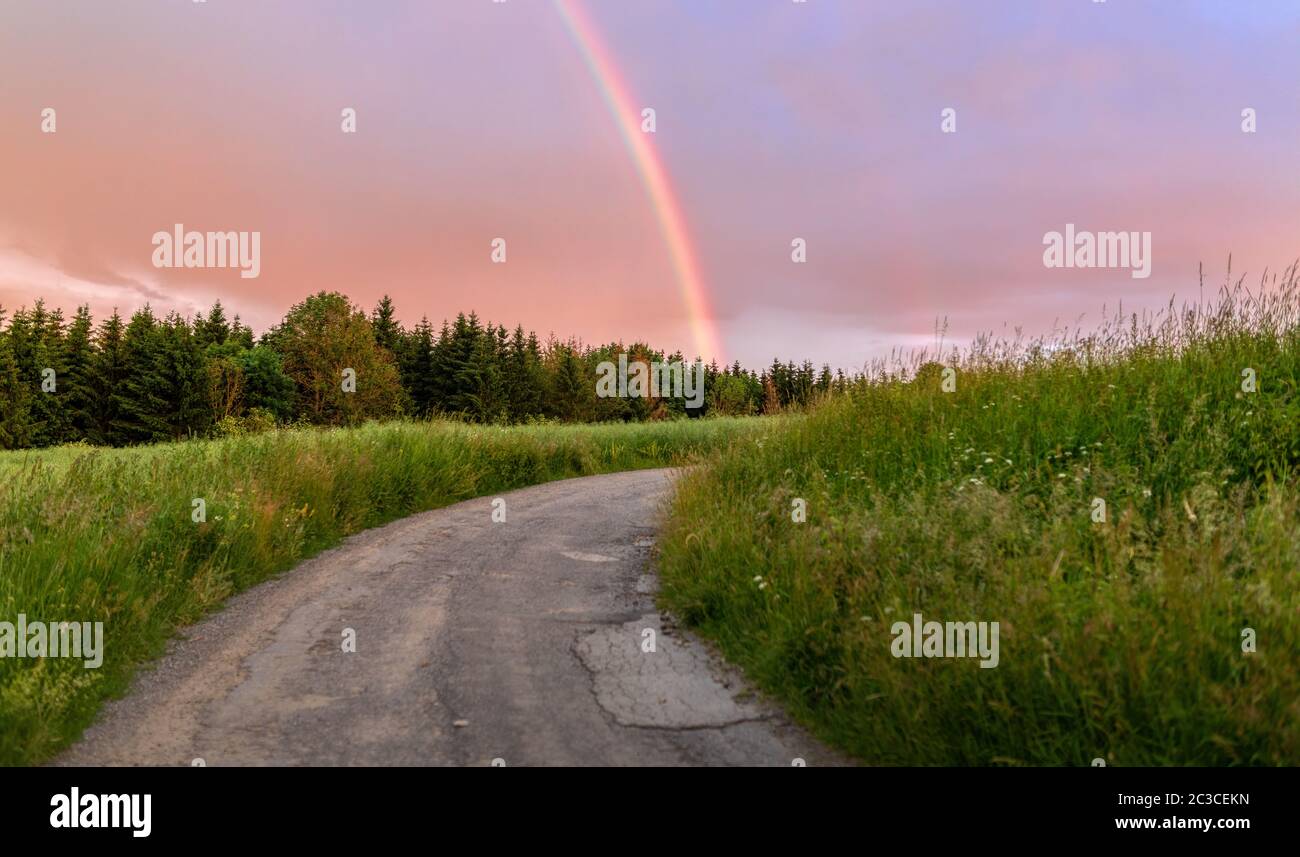 Rainbow over forest and field hi-res stock photography and images - Alamy