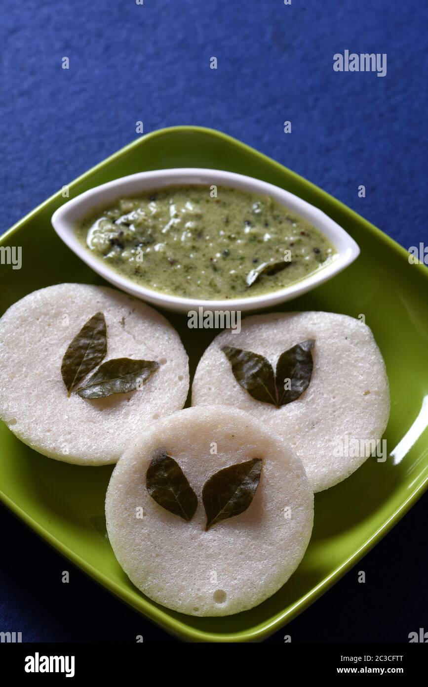 Idli with coconut chutney on blue background, Indian Dish : south ...