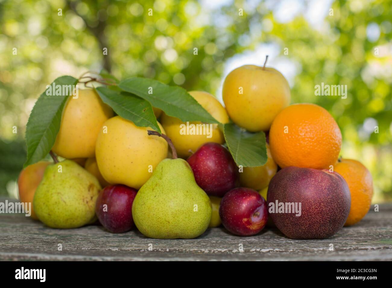 fruits in wooden table, outdoor Stock Photo - Alamy