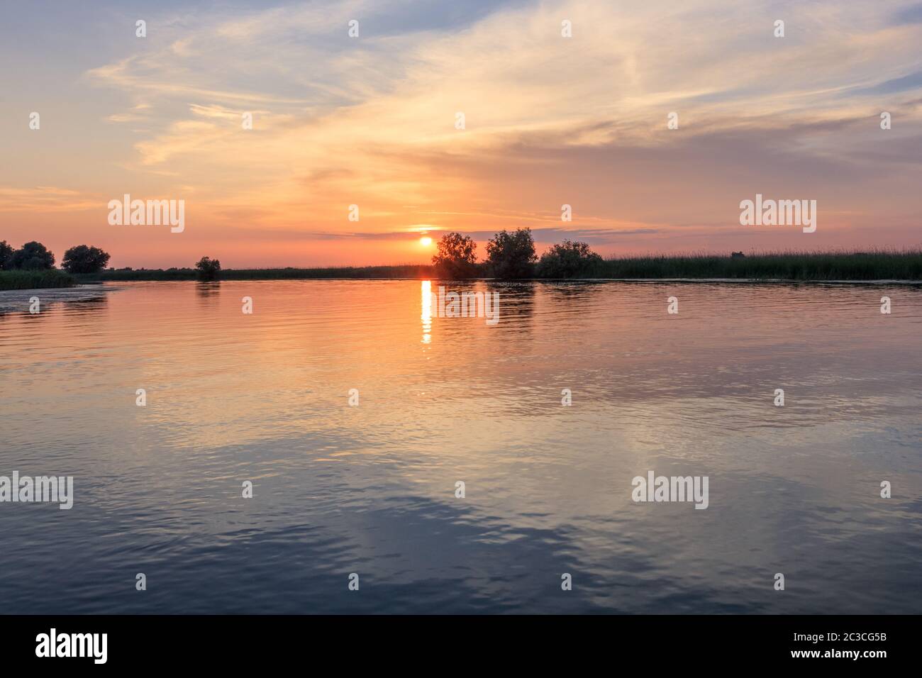 sunset in the Danube Delta, Romania, Europe Stock Photo - Alamy