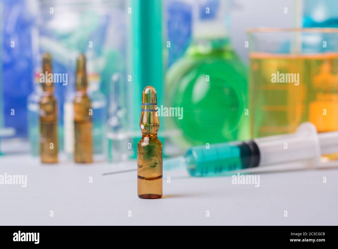 syringe with ampules of drugs Stock Photo - Alamy