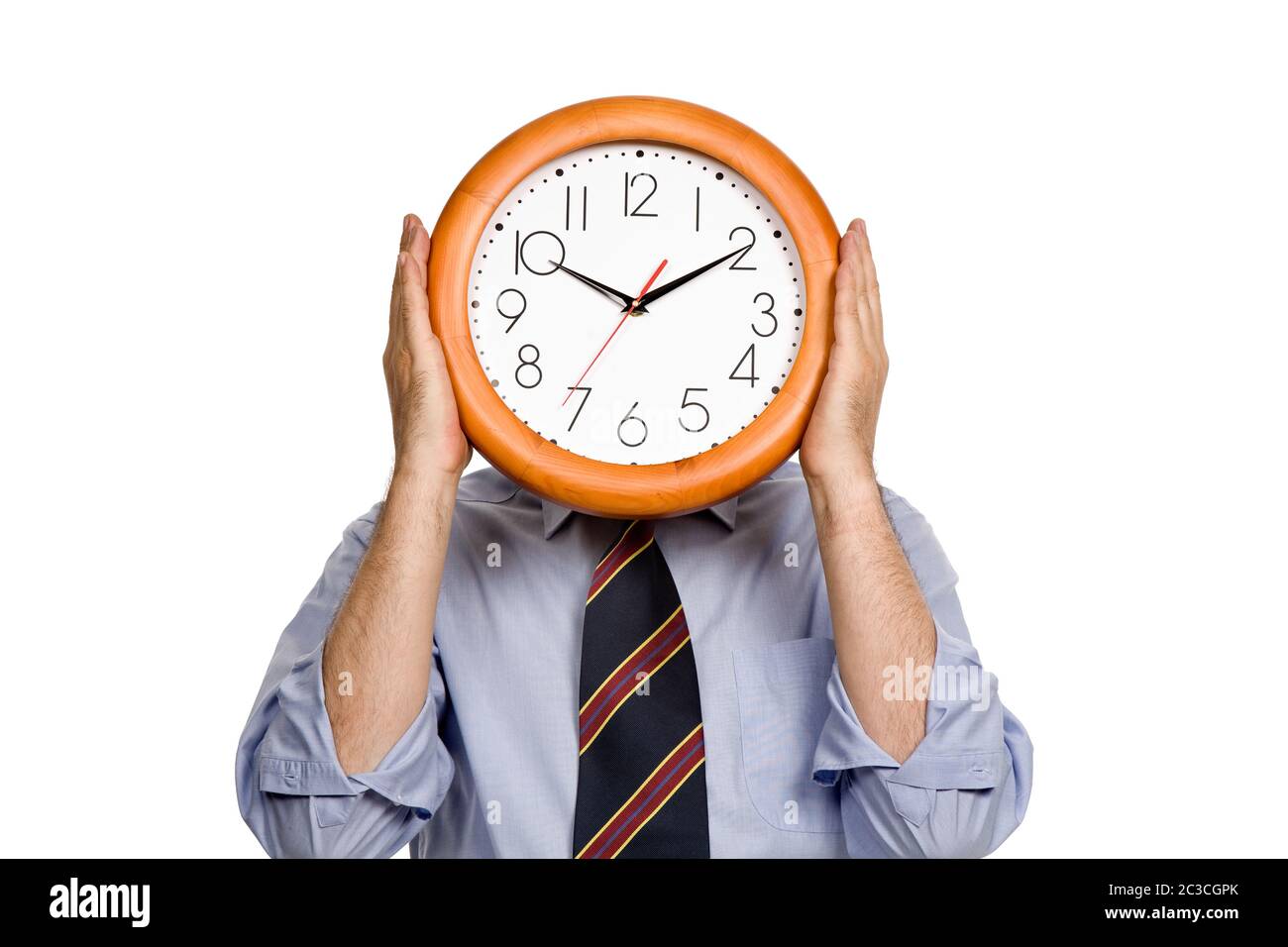 Caucasian man wearing suit holding clock in the head Stock Photo - Alamy