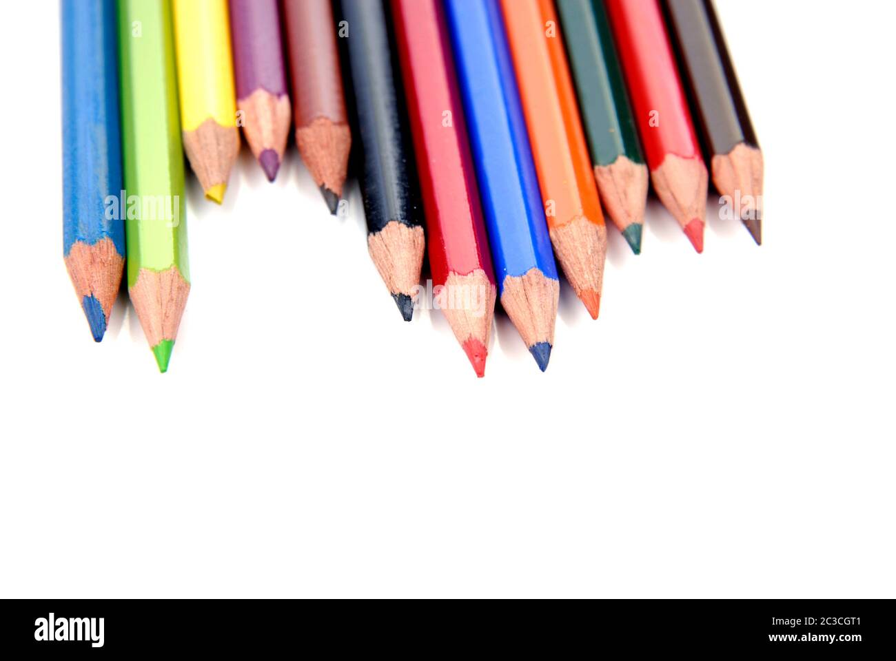 color pencils aligned and isolated on white Stock Photo - Alamy