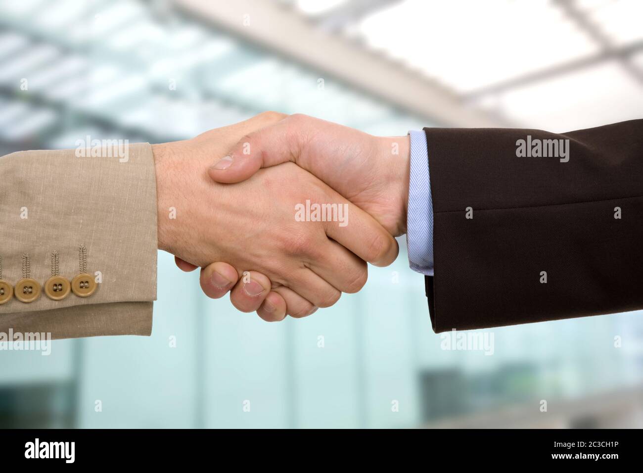 Team hand shake hi-res stock photography and images - Alamy