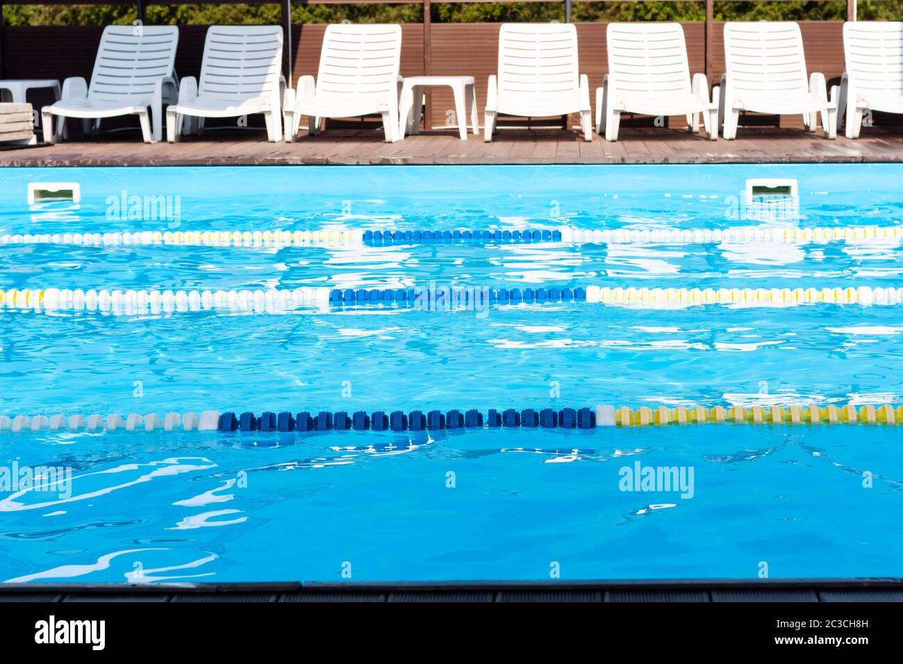 pool with swimming paths, summer sports background Stock Photo - Alamy