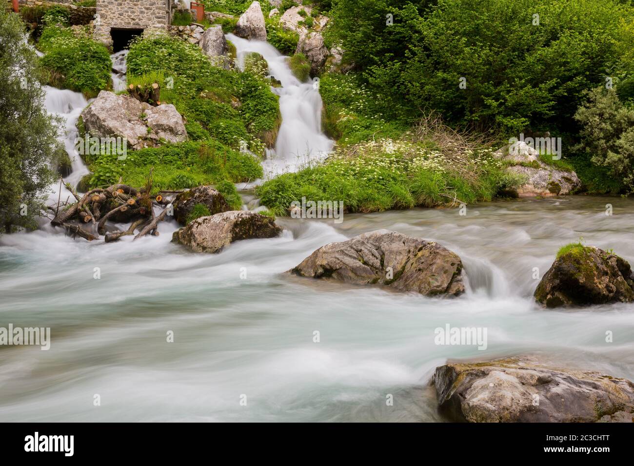 Waterfall in the Cares River located in the Picos de Europa National ...