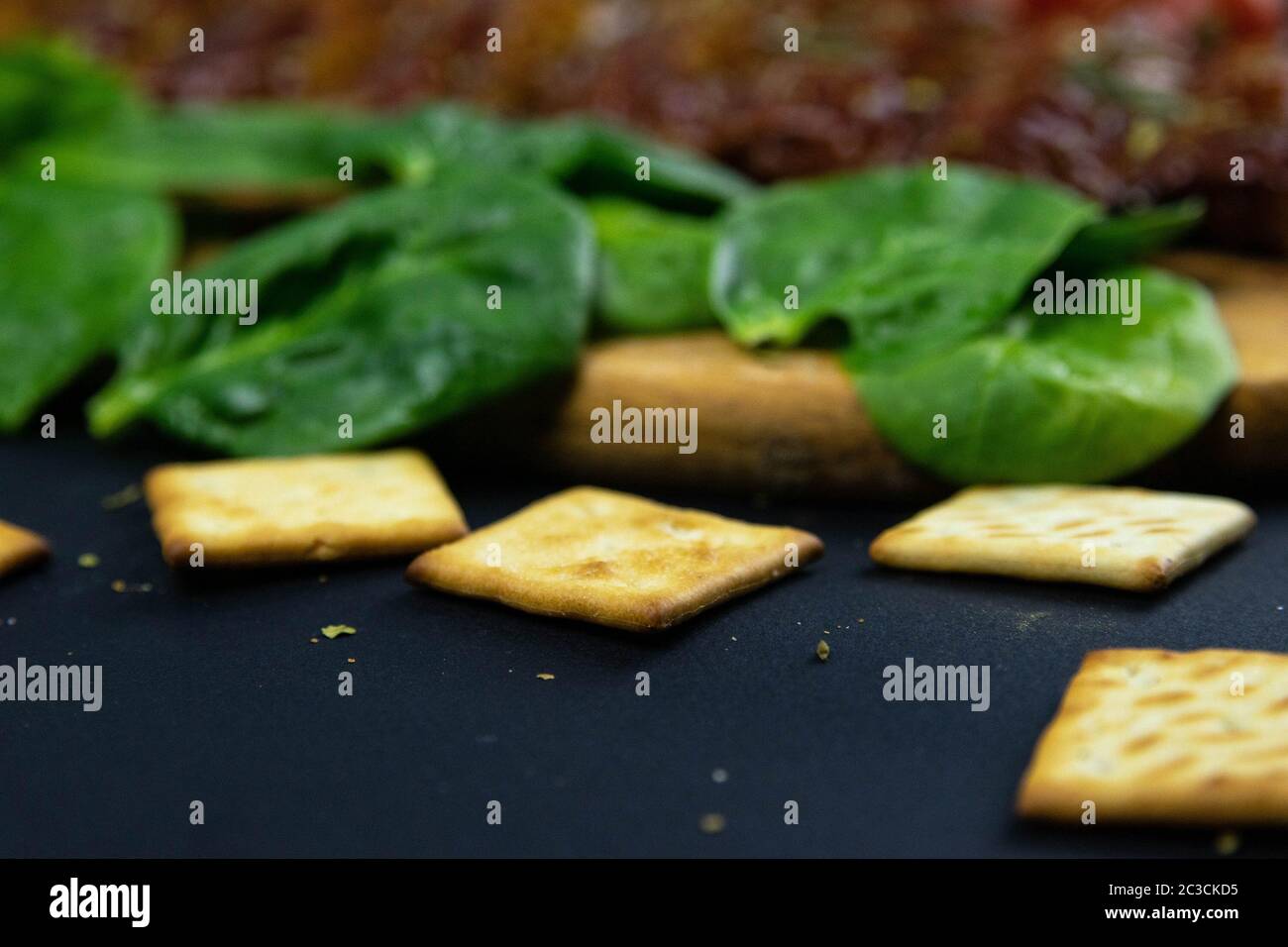 Barbecue Pork Spare Ribs as side view with basil and tomatoes and hot ...