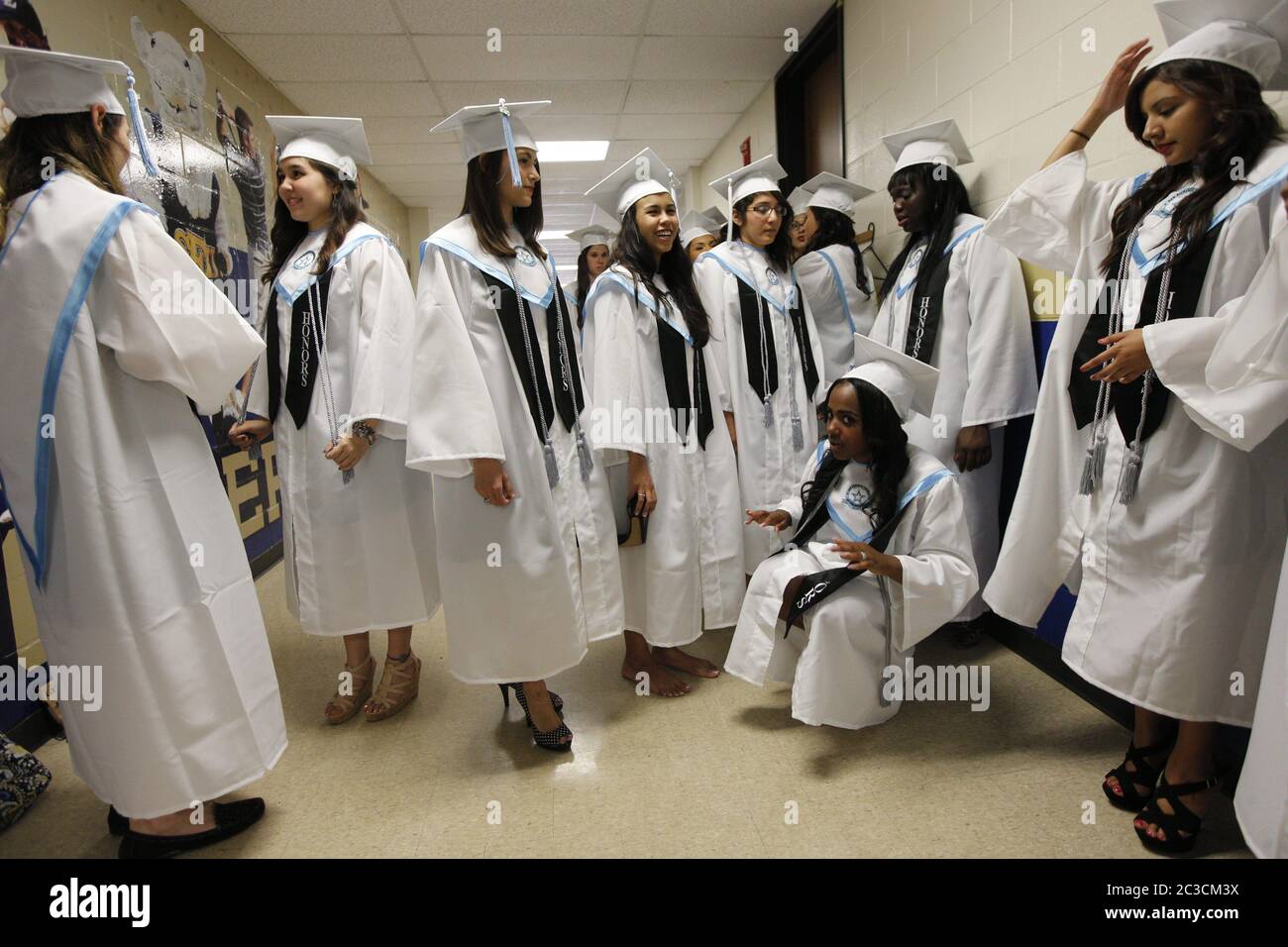 Diverse girls graduating hi-res stock photography and images - Alamy