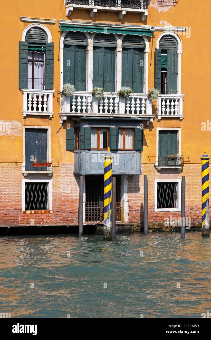 Traditional Venetian house with dock at canal Stock Photo - Alamy