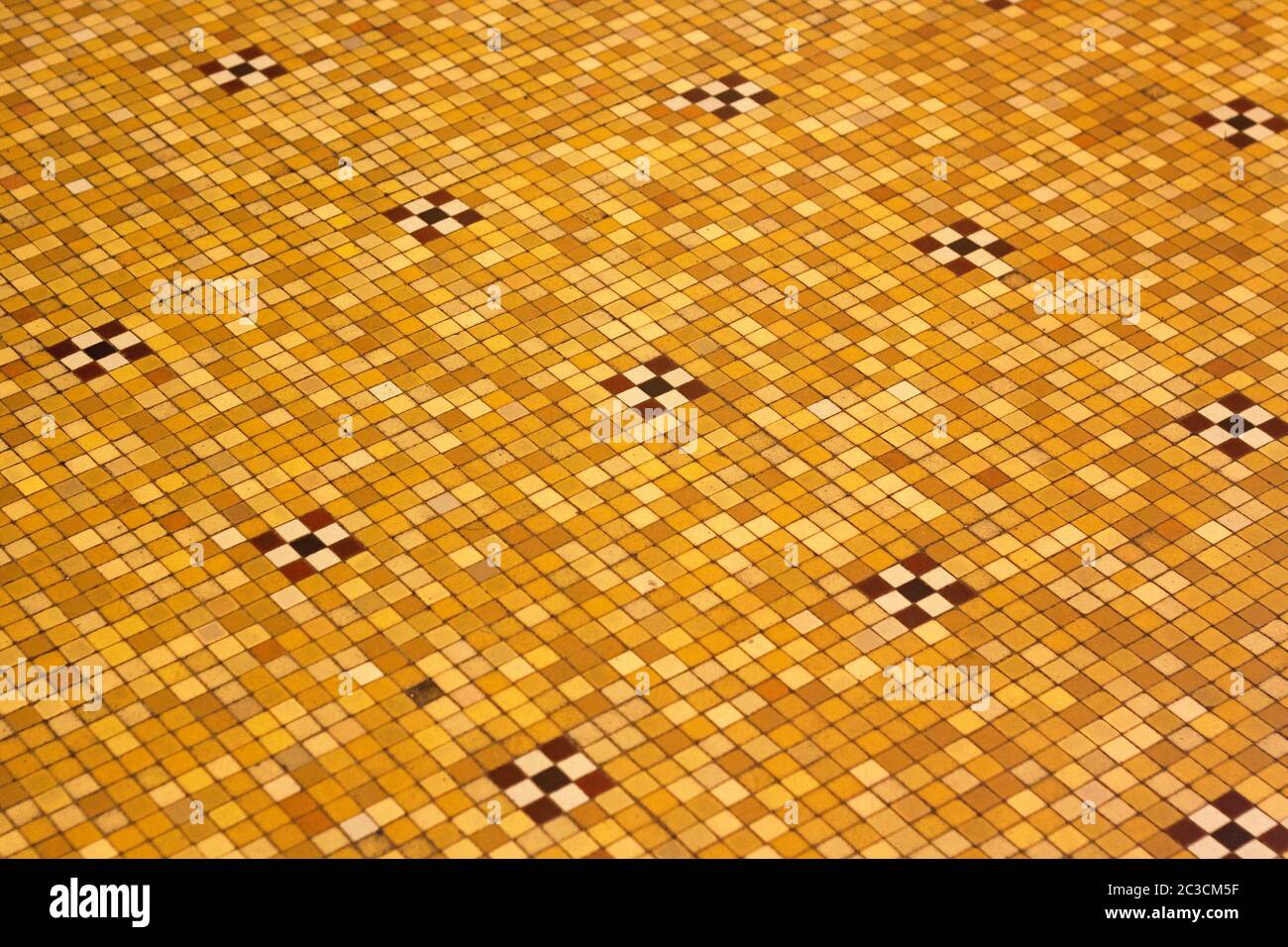 Yellow floor tiles made from marble mosaic stones Stock Photo - Alamy