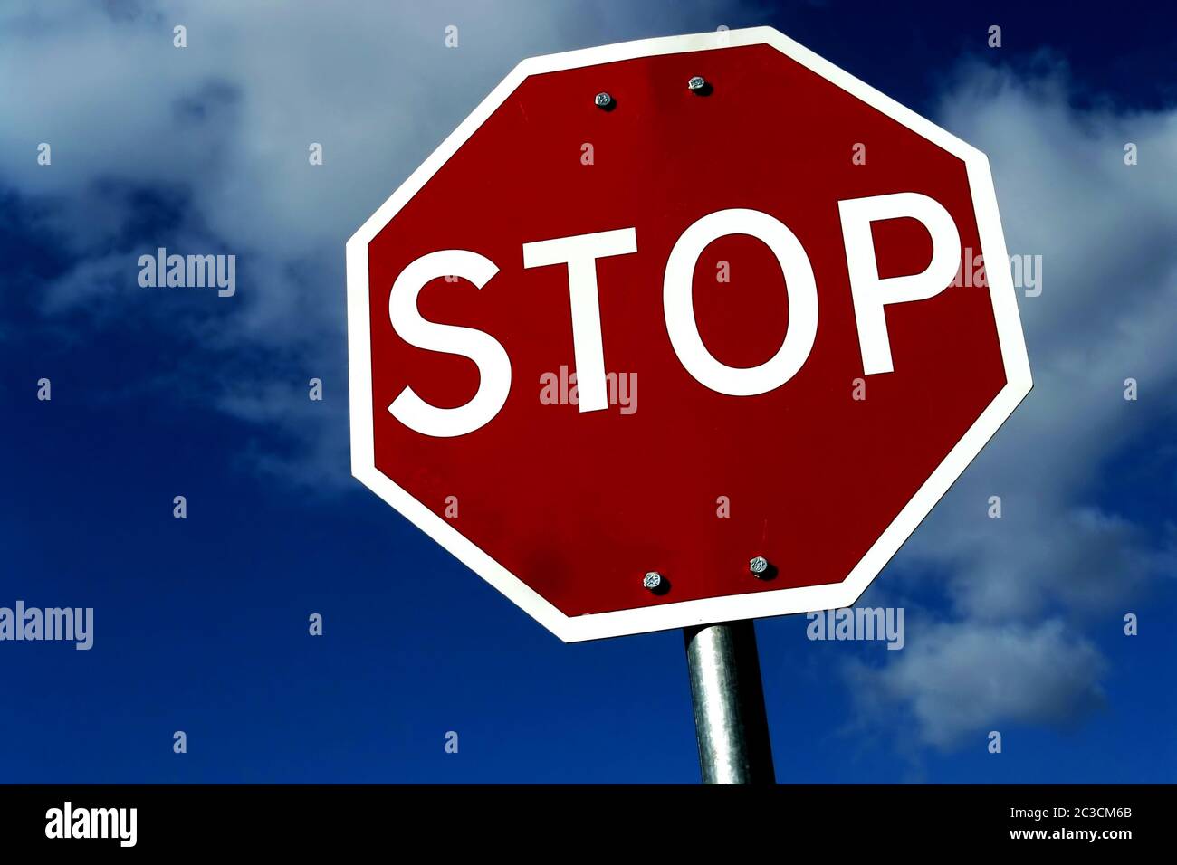 street stop sign with clouds and sky as background Stock Photo - Alamy