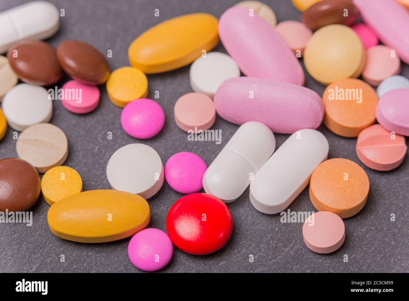 different Tablets pills capsule heap mix therapy drugs Stock Photo - Alamy