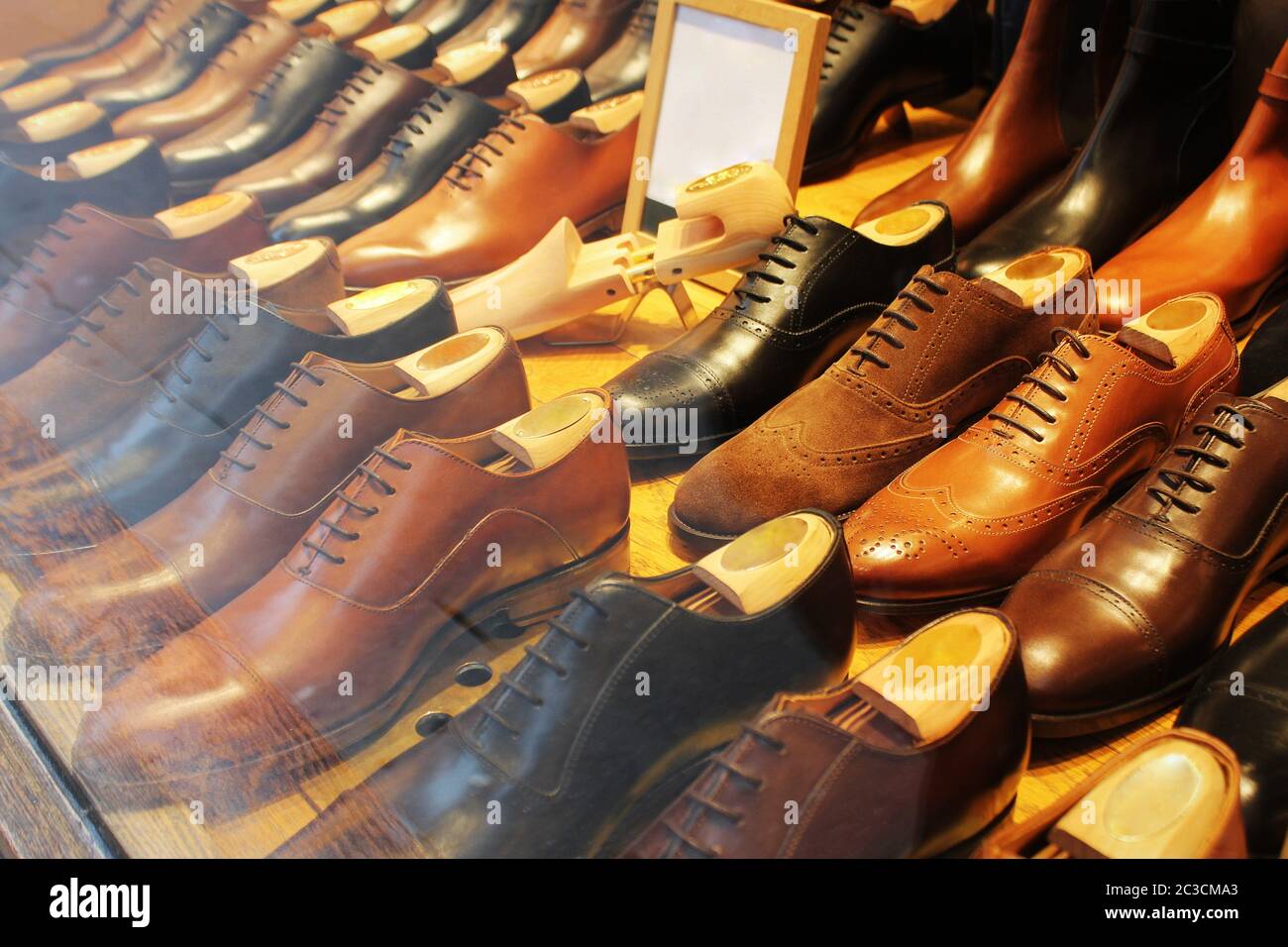Luxury leather men shoes in the shop Stock Photo - Alamy