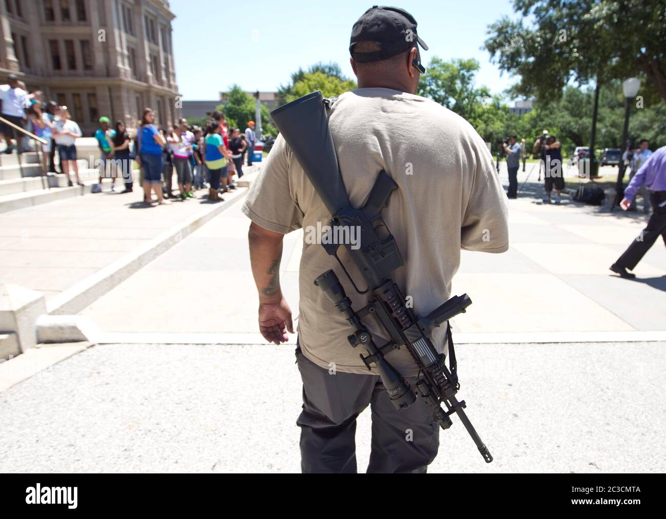 White male carrying gun in public hi-res stock photography and images ...
