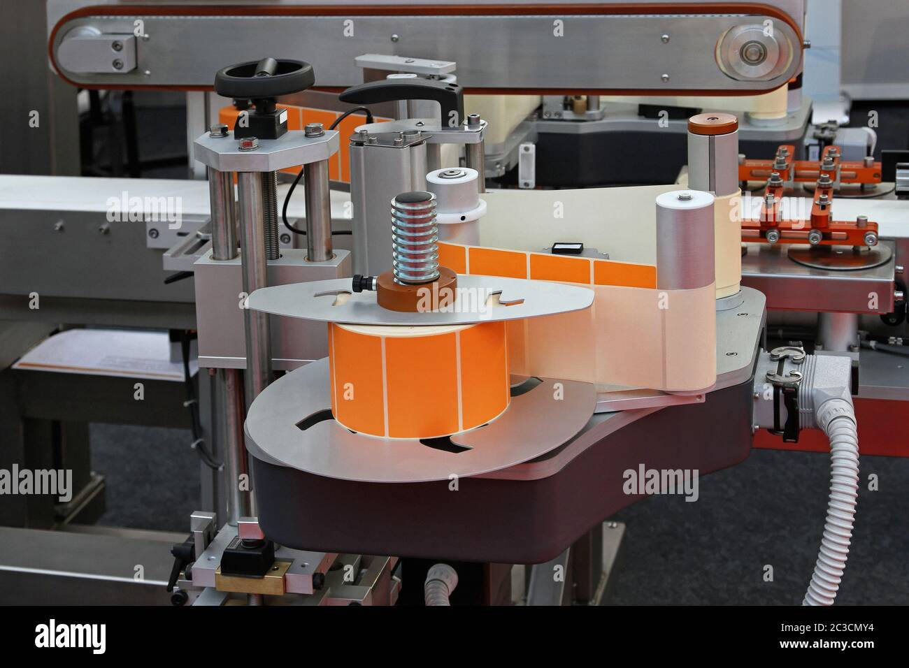 Automated labeling machine equipment with conveyor belt Stock Photo - Alamy