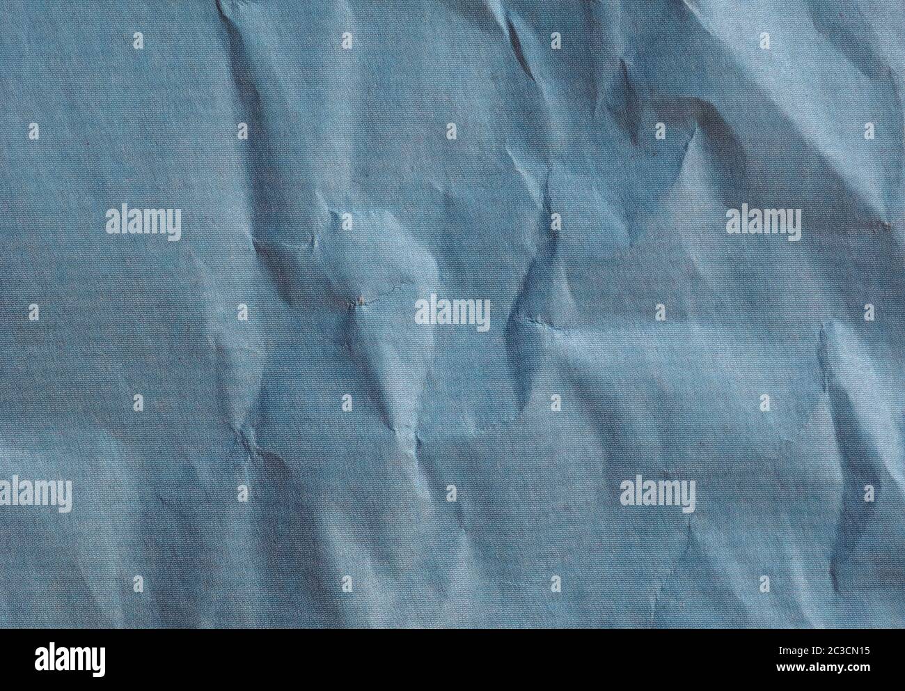 blue crinkled paper texture useful as a background Stock Photo - Alamy