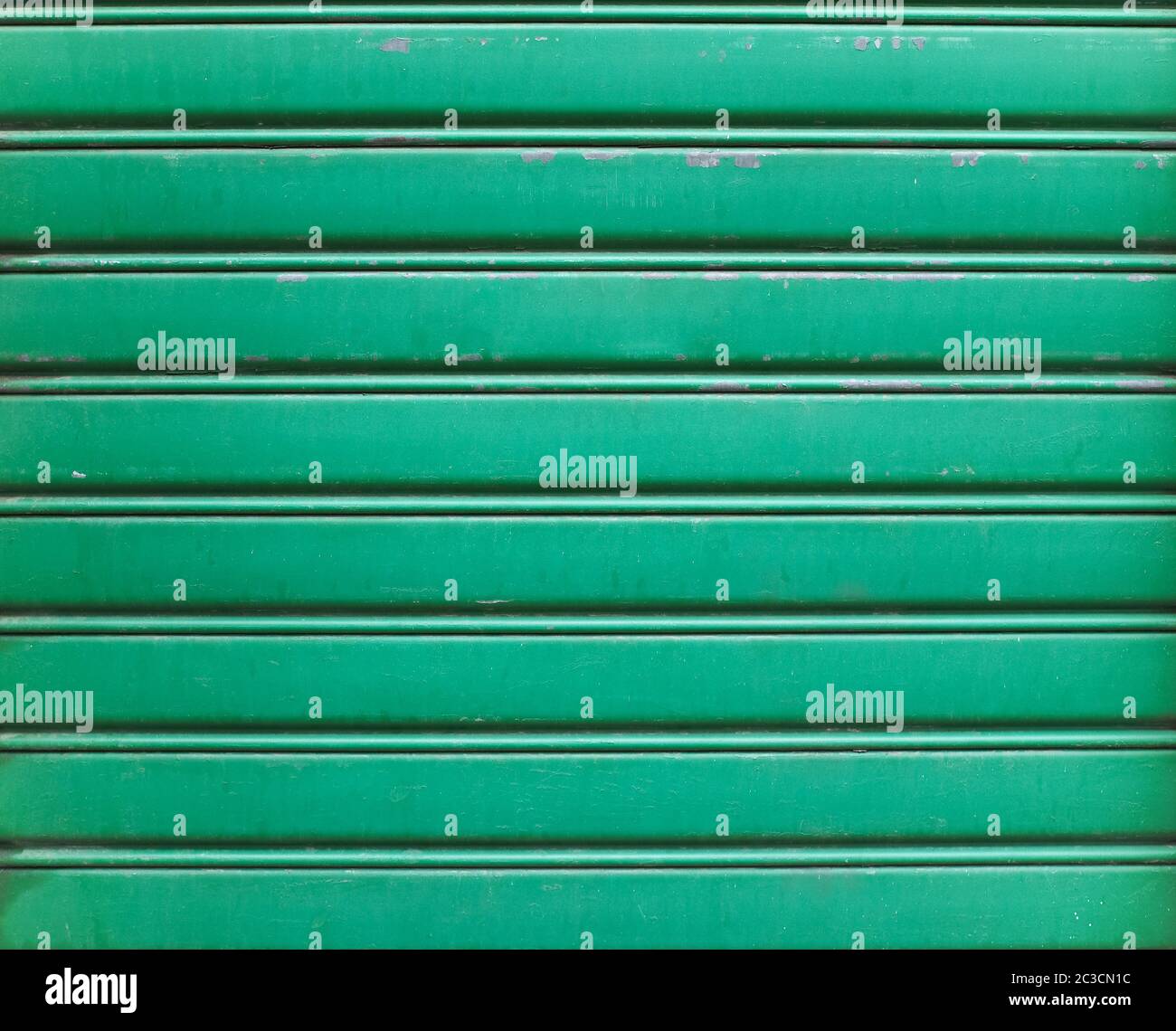 green metal texture of rolling shutter useful as a background Stock ...